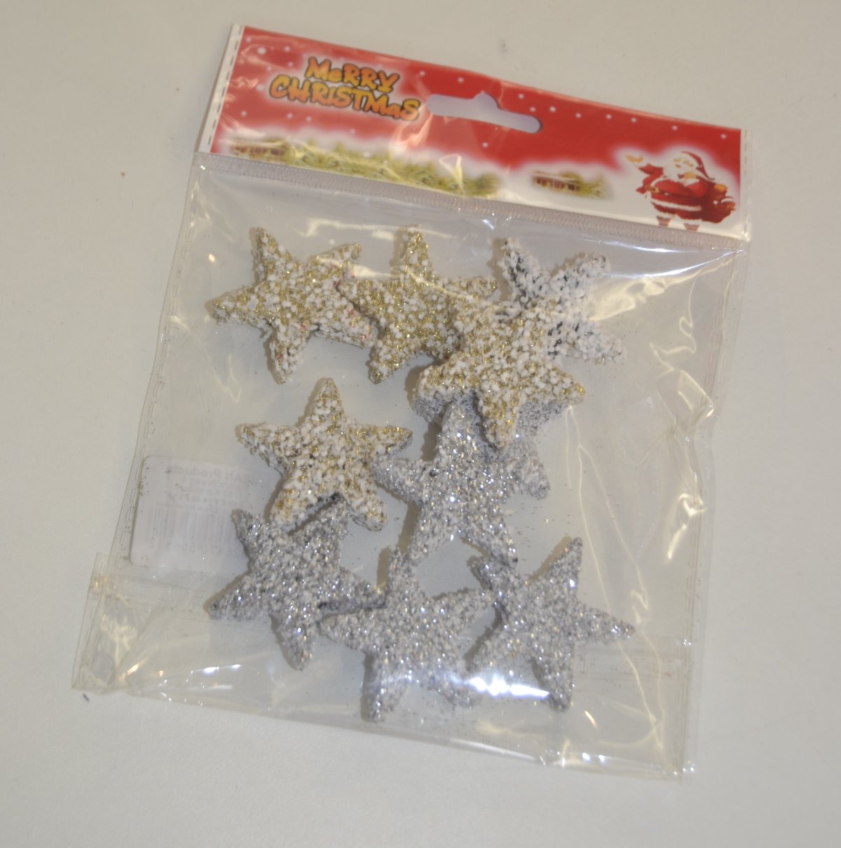 Små stjerner med guld og sølvkrymmel på - Diverse jul - Bundtrade ApS
